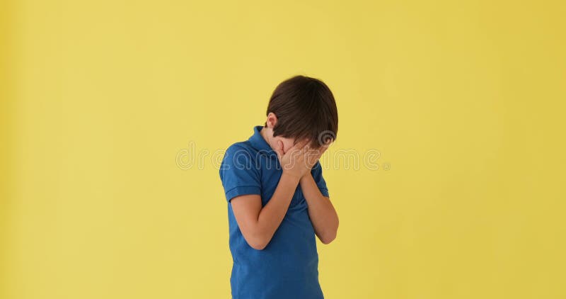 Crying Man in Yellow Hoodie Watching Sad Movie on Laptot and Pointing ...