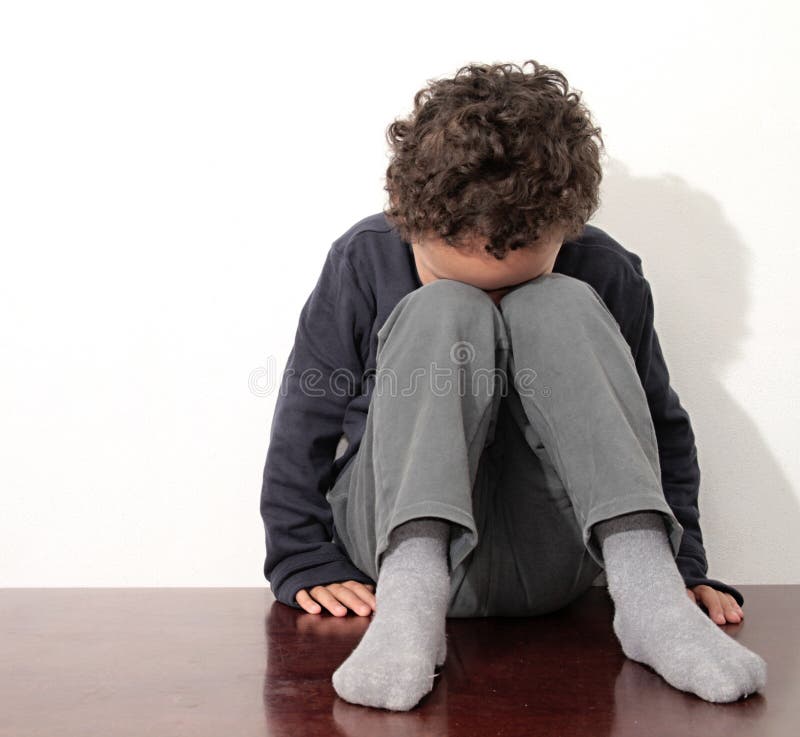 Boy Crying in Poverty with Hand Over Face Stock Photo Stock Photo ...