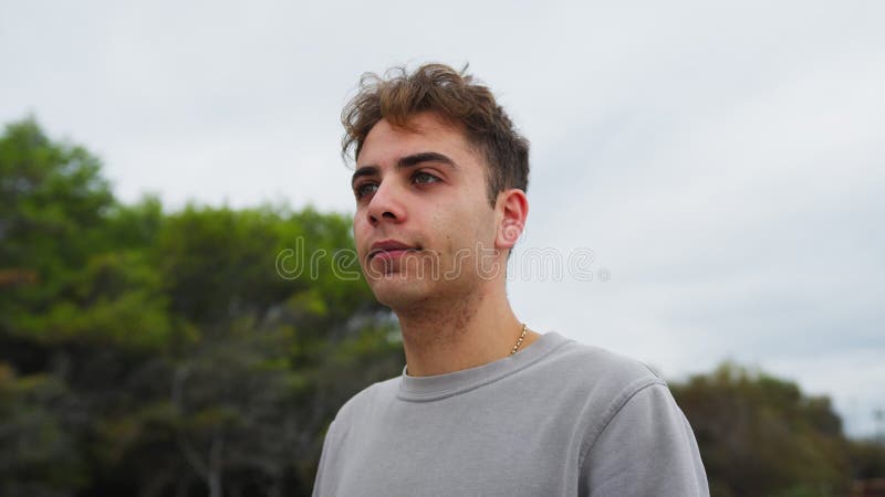 Boy with Curiosity Expression on Face Outdoors in Forest Stock Video ...