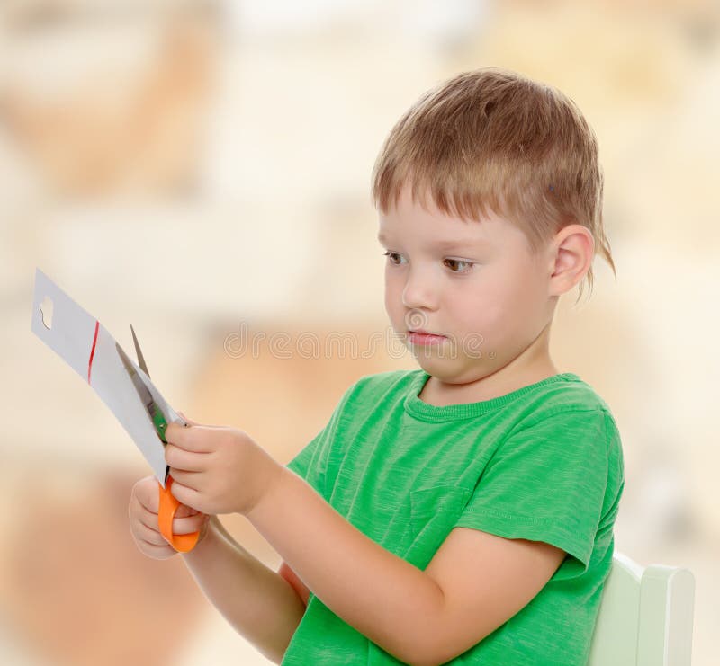 Boy Cuts with Scissors Cardboard Stock Image - Image of kids ...