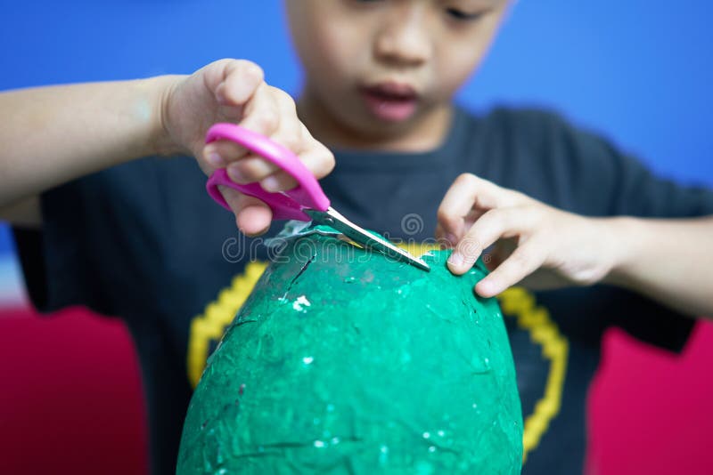Boy is Cutting Paper Art Work in Class Stock Image - Image of ...