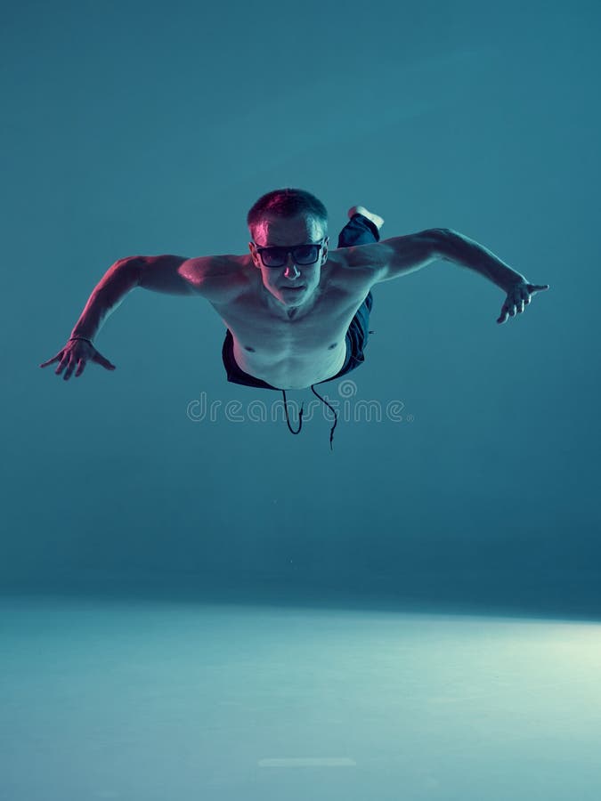 Boy Dancing Contemporary Dance in Studio without a T-shirt in Neon ...