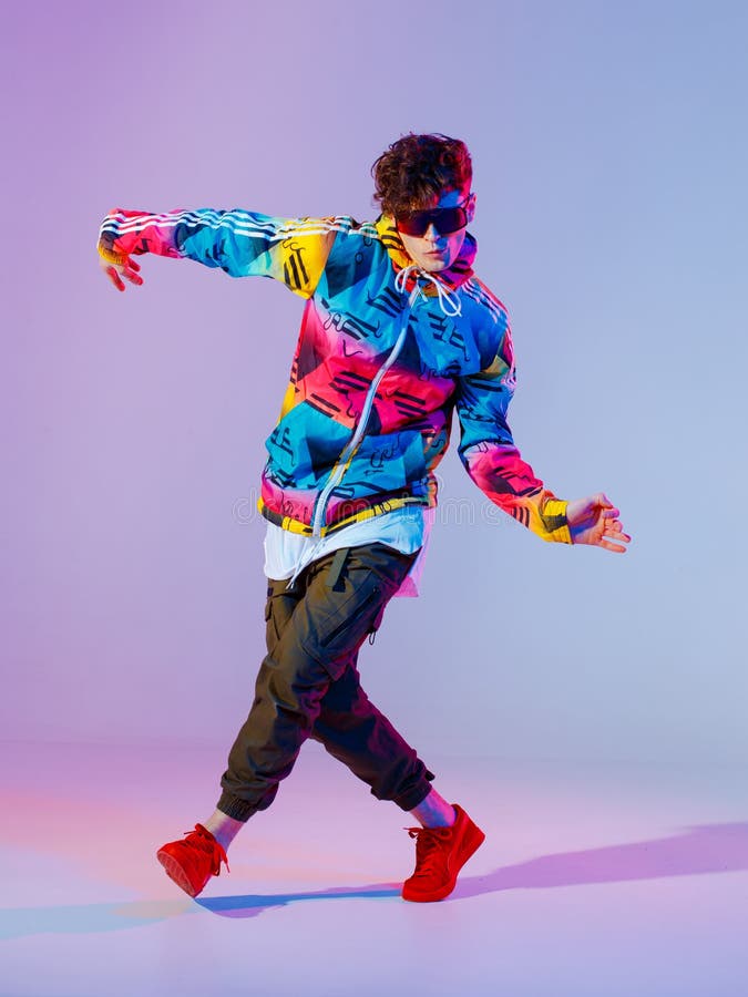 Boy Dancing in Neon Light Studio. Acrobatic Dancer. Stylish Flex. Stock ...