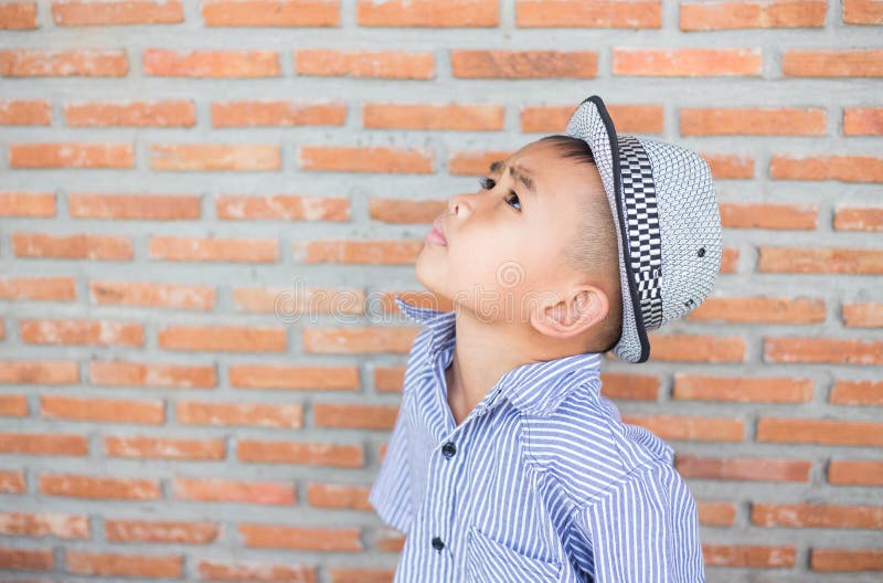 Boy deep in thought stock photo. Image of offspring - 152566580