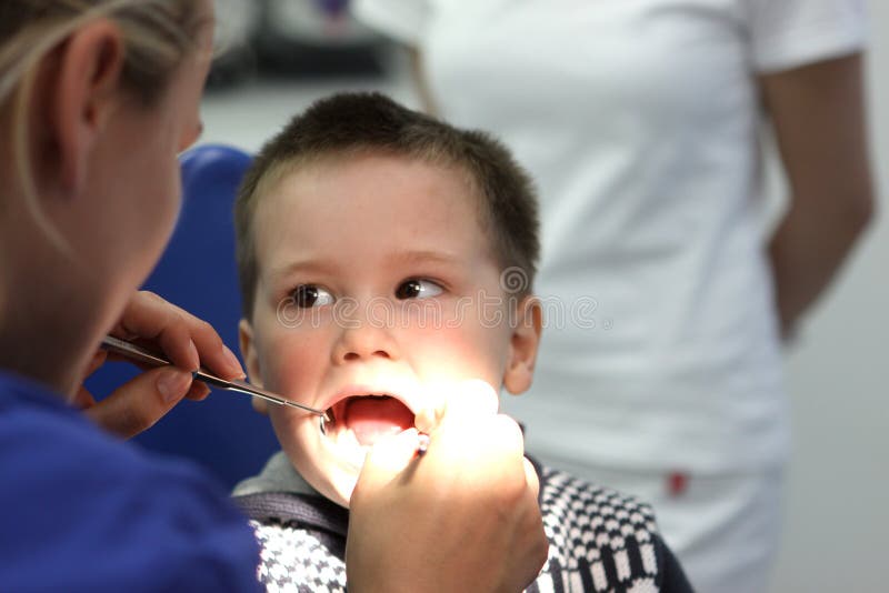 Boy at the dentist stock photo. Image of white, tooth - 19070020