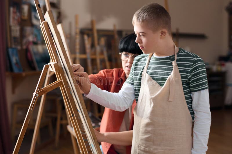 Boy with Disability Drawing Picture in Art Therapy Class Stock Image ...