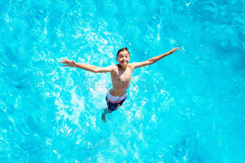 Boy Dive and Splash into the Pool Water Backwards Stock Image - Image ...