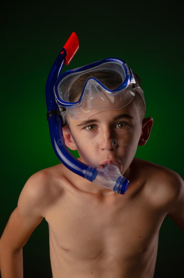 Boy in a diving mask stock photo. Image of isolated - 153534524