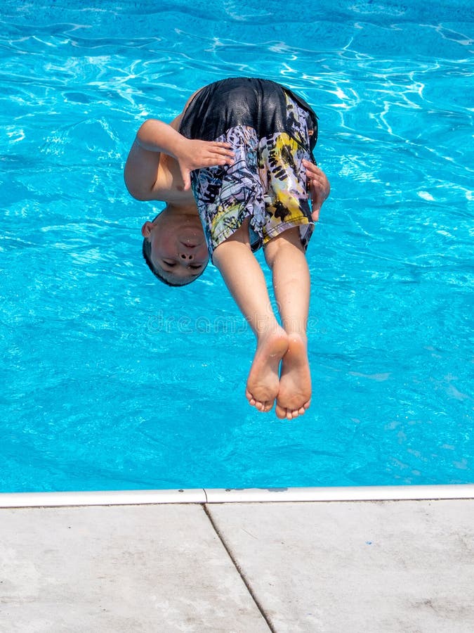 Boy diving into pool stock image. Image of leisure, cooling - 320353525