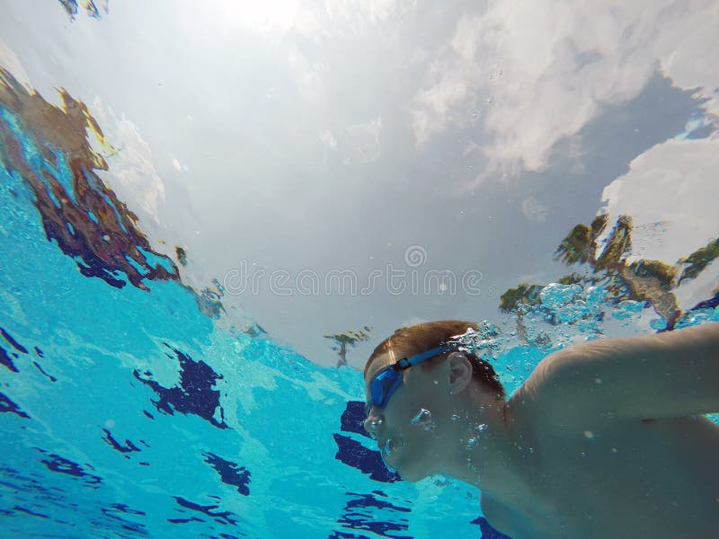 Boy Diving into a Swimming Pool Stock Photo - Image of dive, sport ...