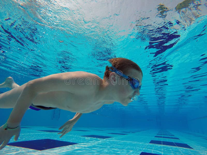 Boy Diving into a Swimming Pool Stock Image - Image of summer, goggles ...