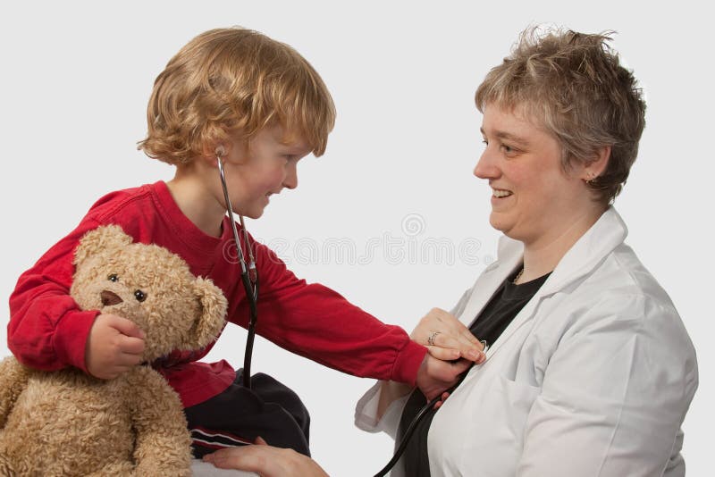 Boy at doctors office stock photo. Image of adult, examination - 11658402