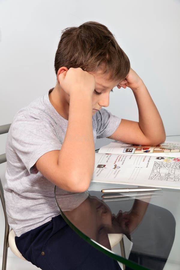Boy Does His Homework on a Glass Table Stock Photo - Image of learning ...