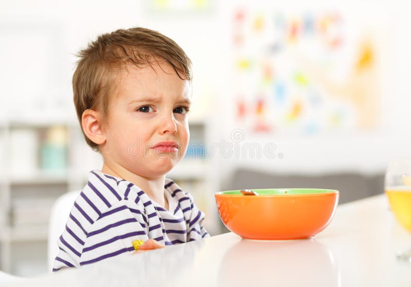 Boy does not want to eat stock photo. Image of child - 49409298