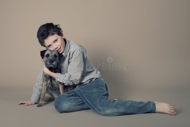 Boy and his dog stock photo. Image of cheerful, teenager - 5572734