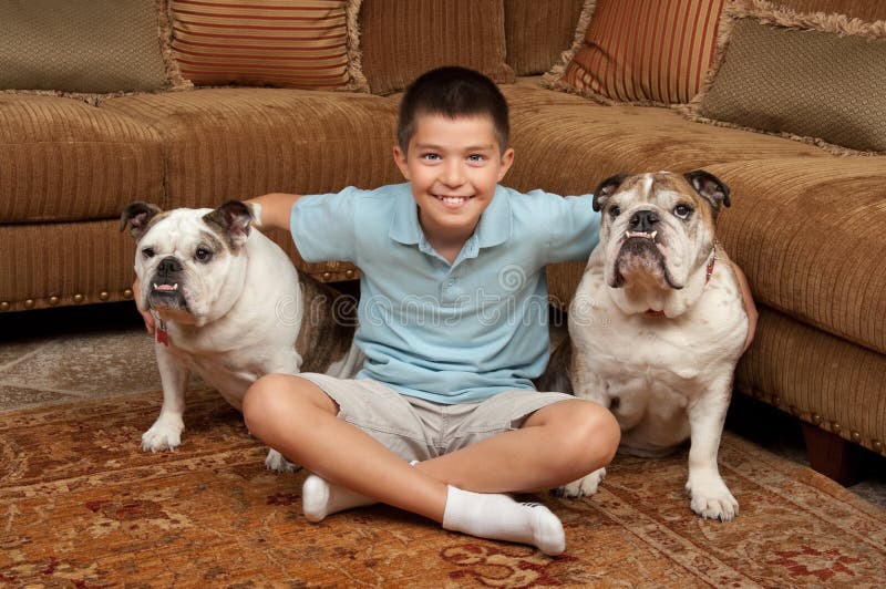 Boy with his pets stock photo. Image of handsome, meadow - 15321724