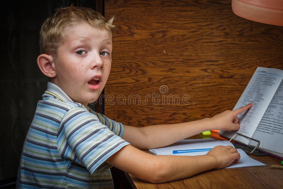 Boy Doing Hard Homework at Home Stock Image - Image of research ...