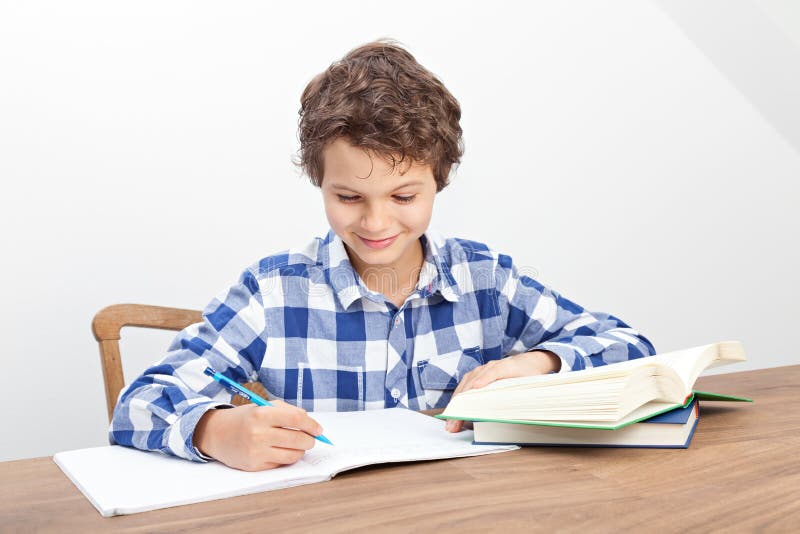 A Boy is Doing His Homework Stock Image - Image of teens, homeschooling ...