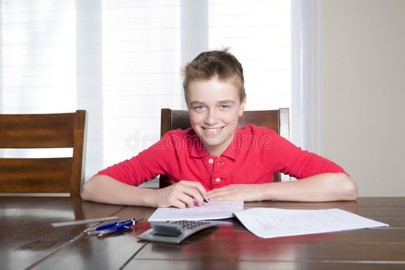 Boy Doing His Homework at Home Stock Image - Image of homework, writing ...
