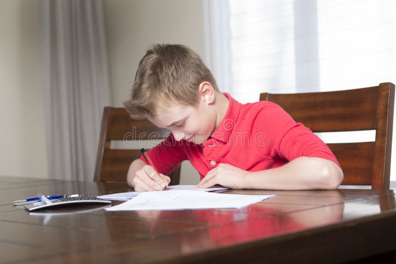 Boy Doing His Homework at Home Stock Image - Image of child, education ...