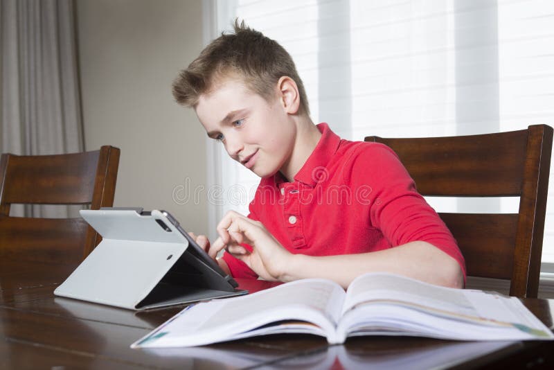 Boy Doing His Homework at Home Stock Image - Image of school, elearning ...