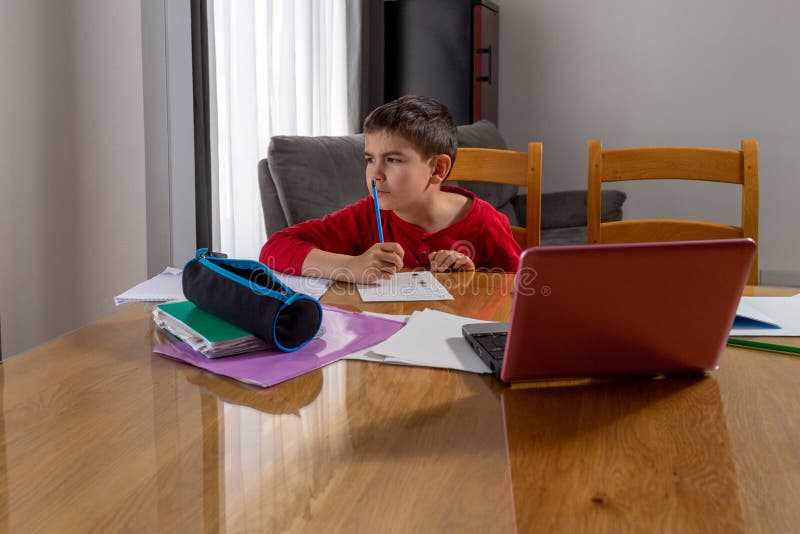 Boy Doing His Homework while Lock Down, Studying Remotely Stock Image ...