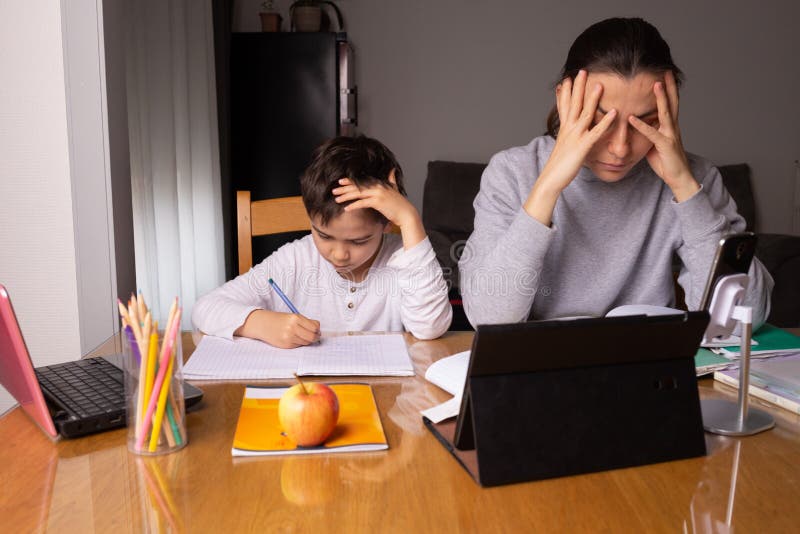Boy Doing His Homework while Lock Down, Studying Remotely Stock Photo ...