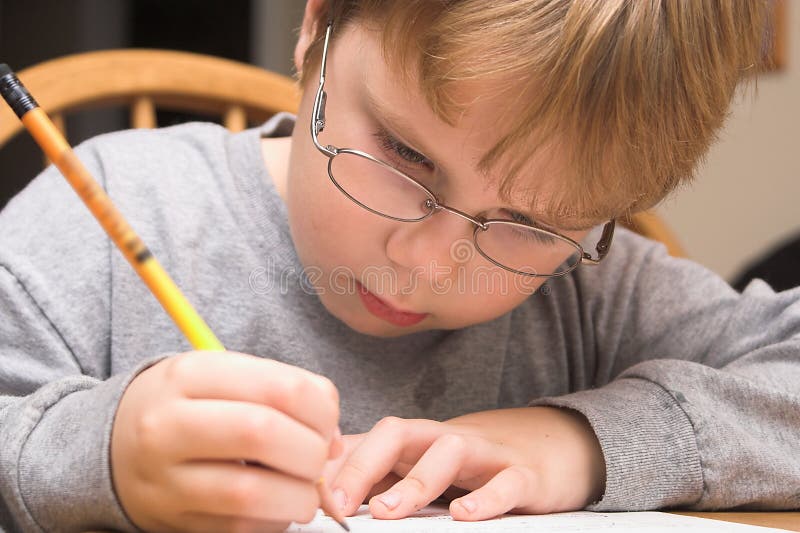 Boy Doing Homework stock photo. Image of grammar, homework - 1524264