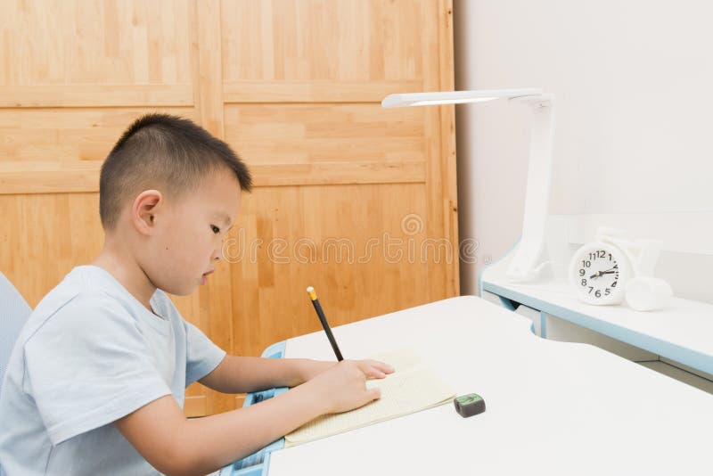 Kid Doing Homework with Mask Stock Image - Image of wearing, asian ...