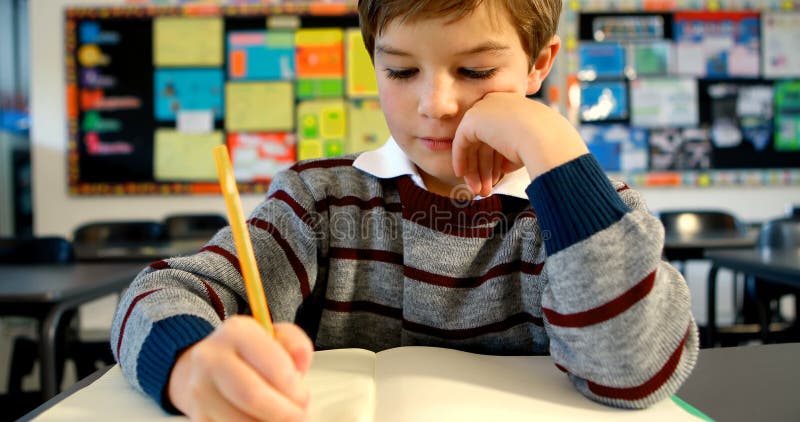 Boy Doing Homework in Classroom 4k Stock Footage - Video of male, class ...