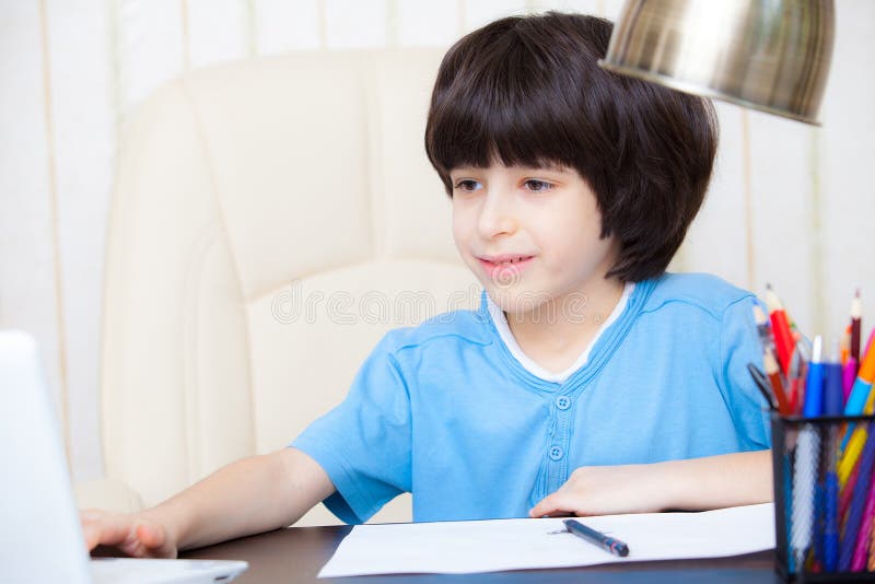 Boy Doing Homework with Computer Stock Photo - Image of file, happy ...