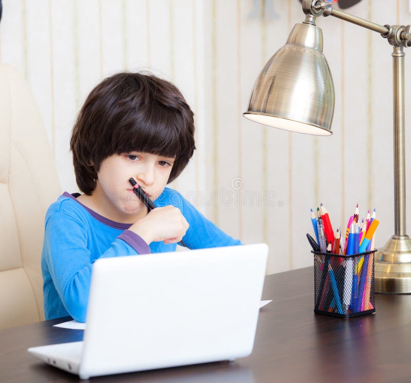 Boy Doing Homework with Computer Stock Image - Image of moscow, male ...