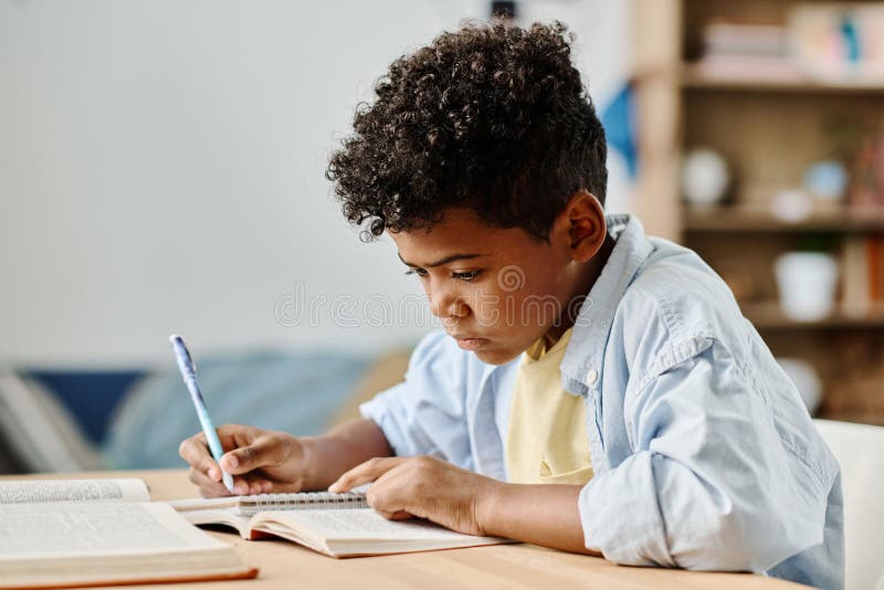 Boy Doing Homework at Desk at Home Stock Photo - Image of homework ...