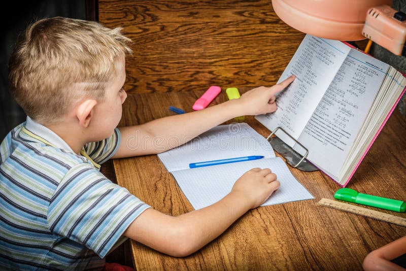 Boy Doing Hard Homework at Home Stock Image - Image of research ...