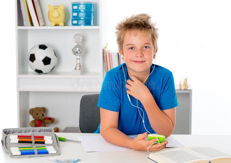 Boy is Doing Homework and Listening Music Stock Image - Image of modern ...