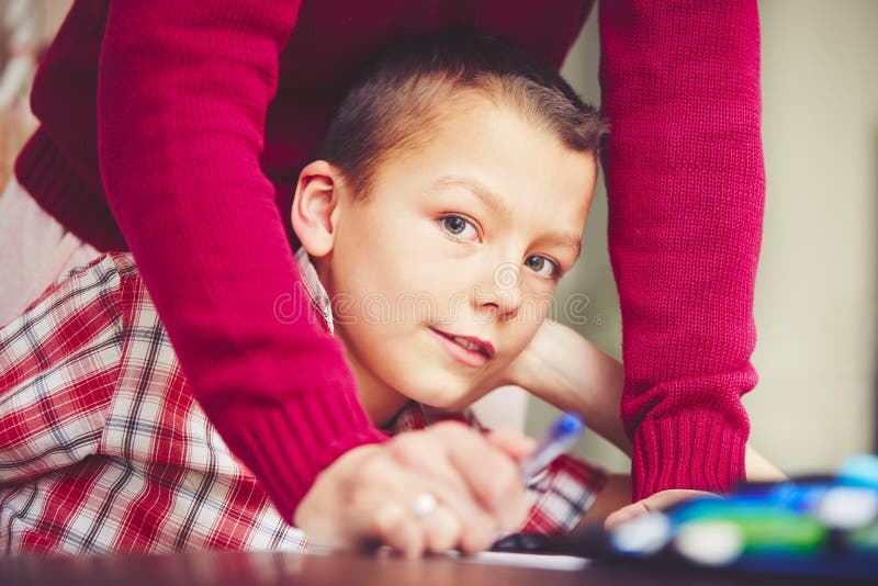Boy is doing homework stock image. Image of caucasian - 68754955