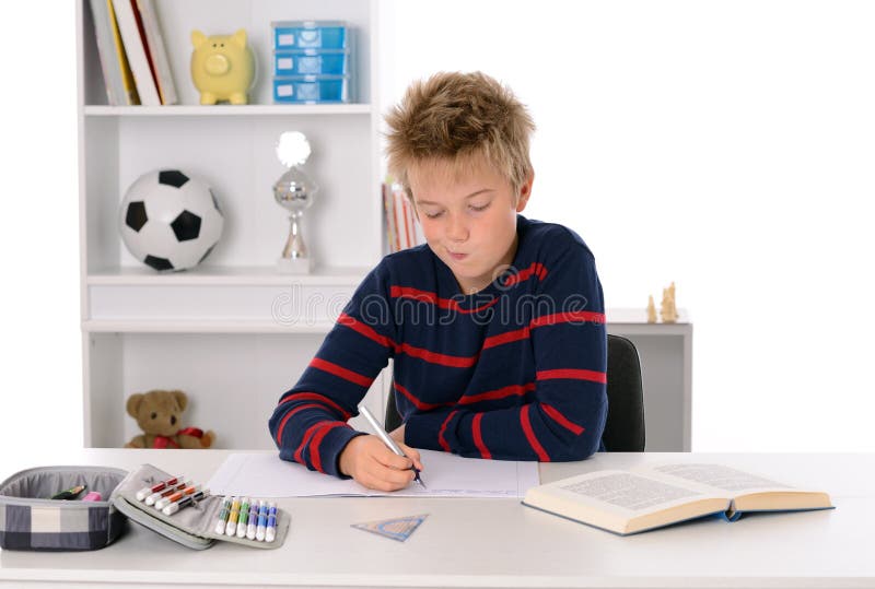 Boy is doing homework stock image. Image of cerebration - 43646043