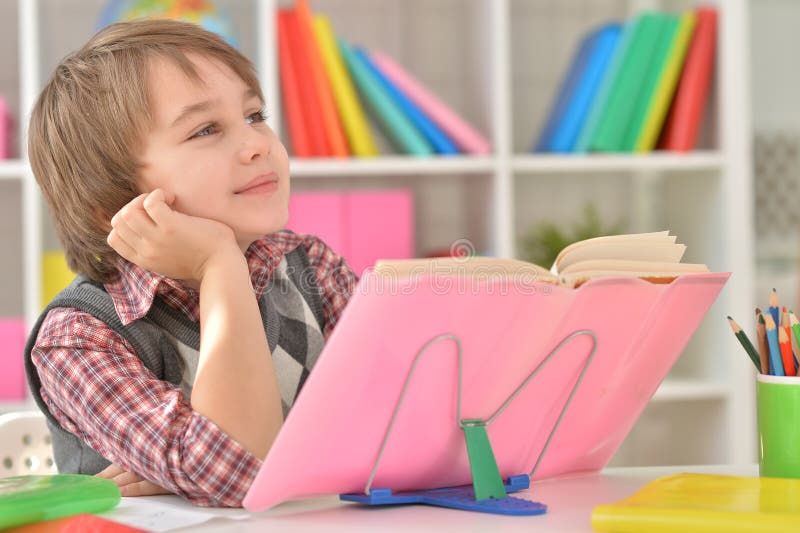 Boy doing homework stock photo. Image of class, school - 88123578