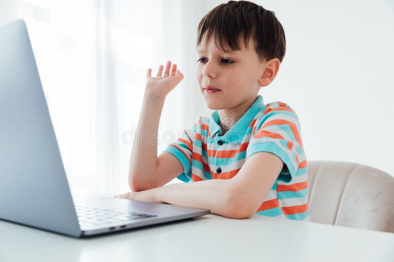 Boy Doing Homework at School on Computer Stock Photo - Image of family ...