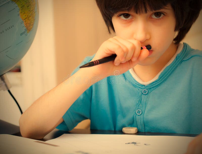 Boy doing homework stock photo. Image of happy, computer - 98720930