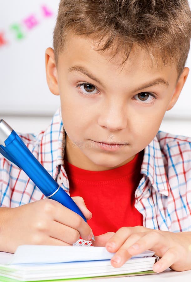 Boy doing homework stock image. Image of portrait, class - 44350795
