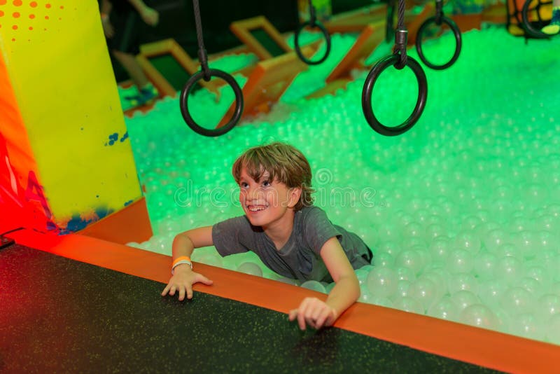Boy Doing an Indoor Obstacle Course Stock Image - Image of play ...