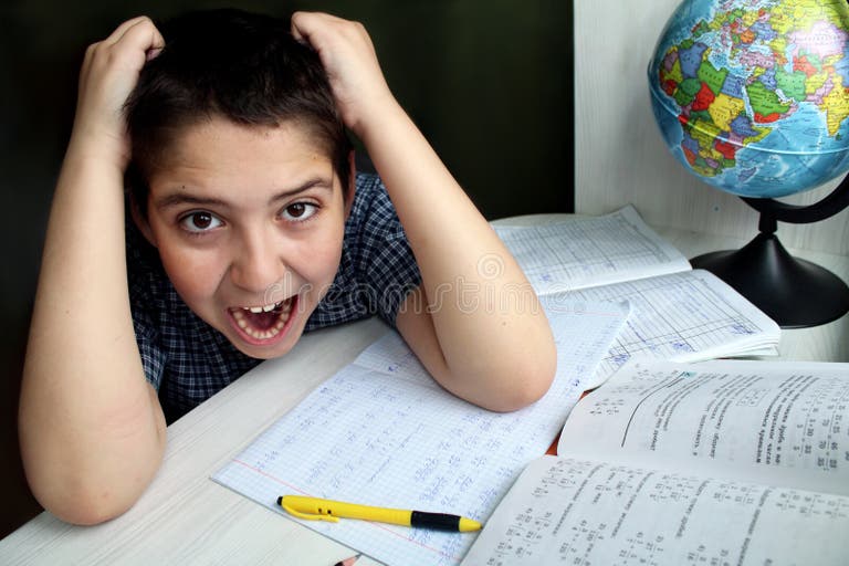 Boy doing math homework stock photo. Image of subject - 52849012
