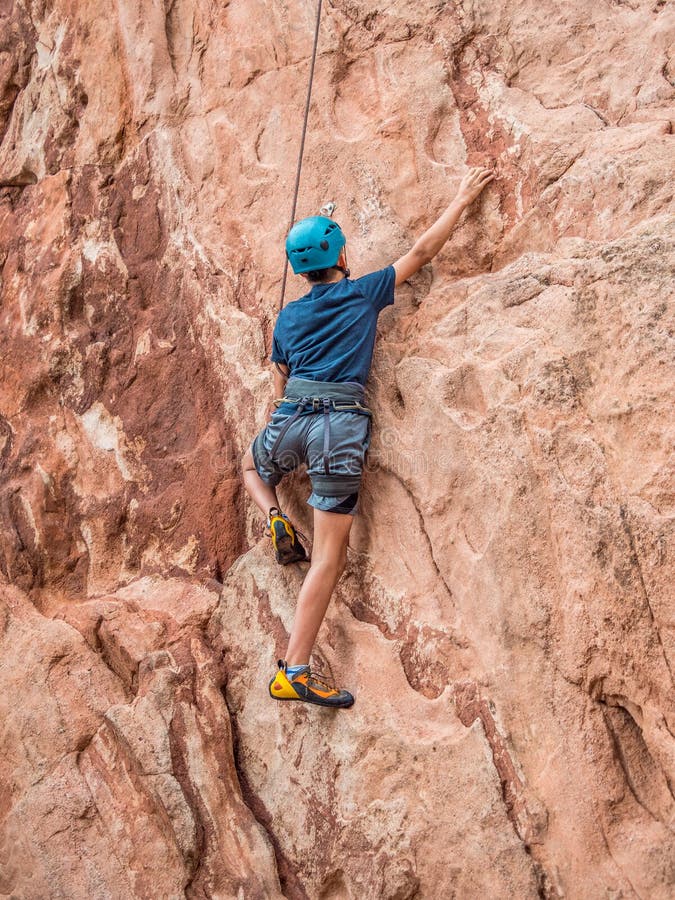 A boy doing rock climbing stock image. Image of high - 130504167