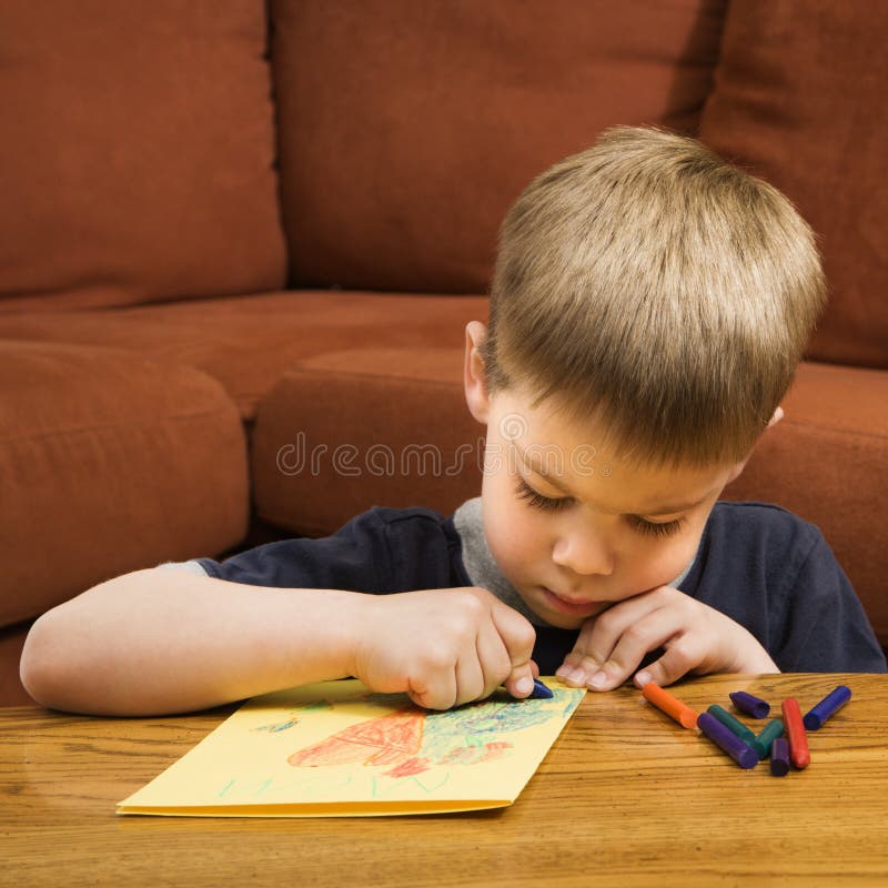 Boy drawing. stock photo. Image of indoors, artwork, creativity - 2432114