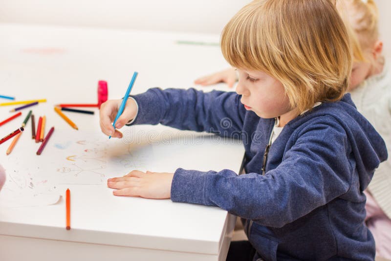 Boy Drawing with Colorful Crayons Stock Photo - Image of youth, playful ...