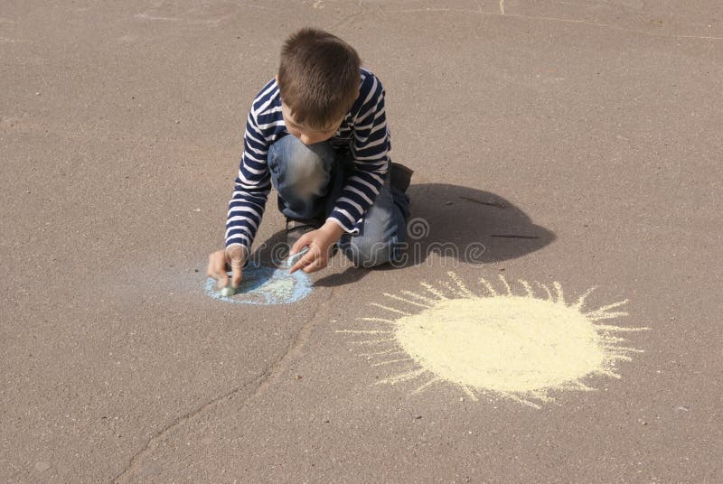 Boy drawing Earth and sun stock image. Image of earth - 58030163