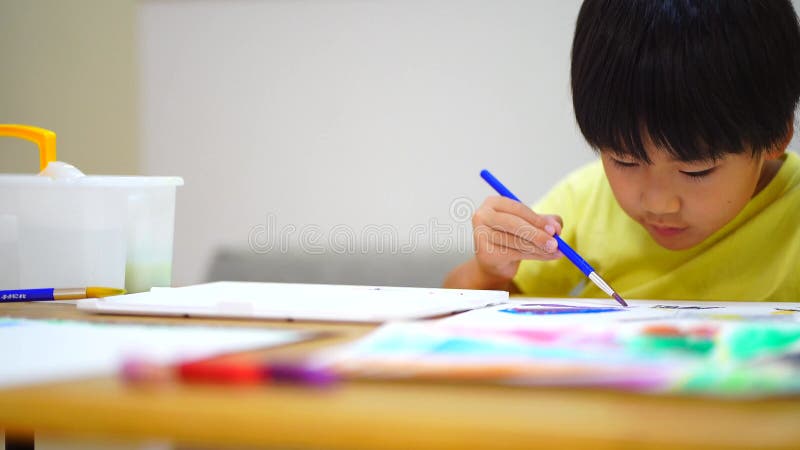 Boy painting at home stock video. Video of draw, toddler - 255709113
