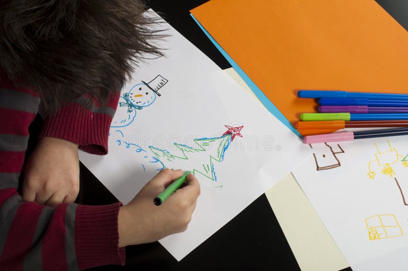 Boy drawing with markers stock image. Image of child - 27876773