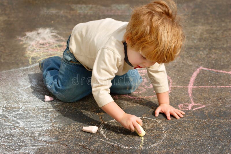 Boy Drawing Outside with Chalk Stock Image - Image of preschooler ...
